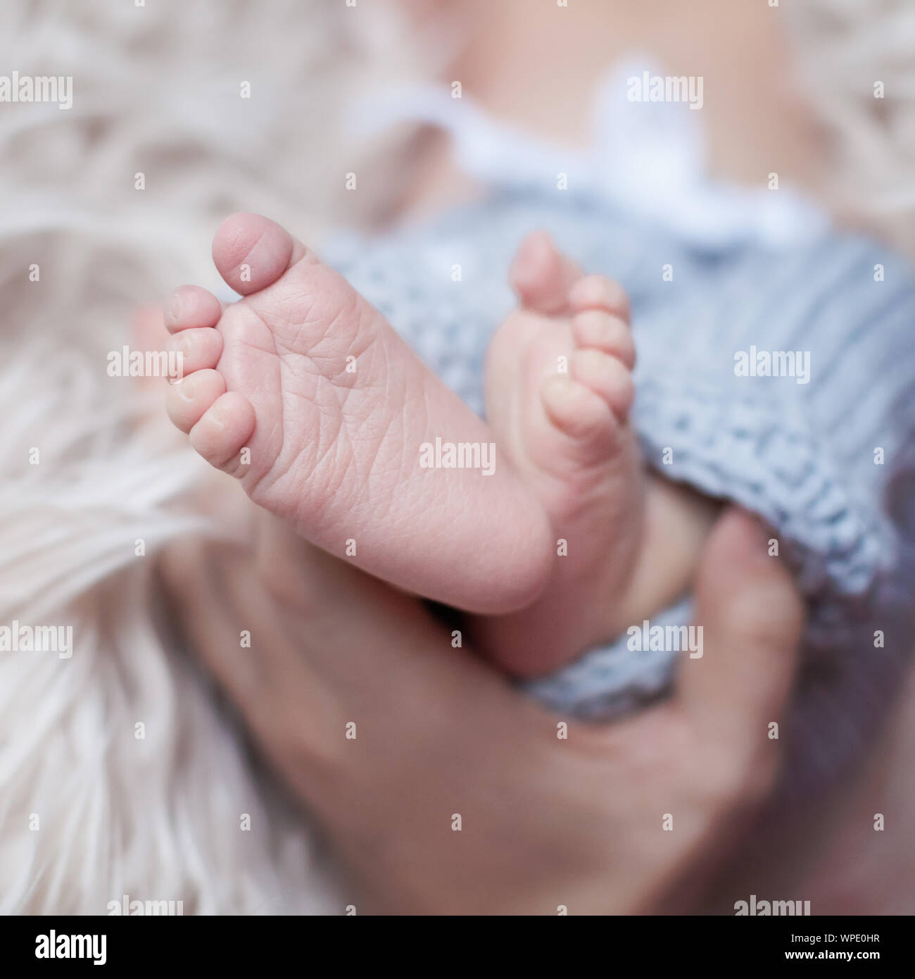 Closeup photo of newborn baby feet Stock Photo - Alamy