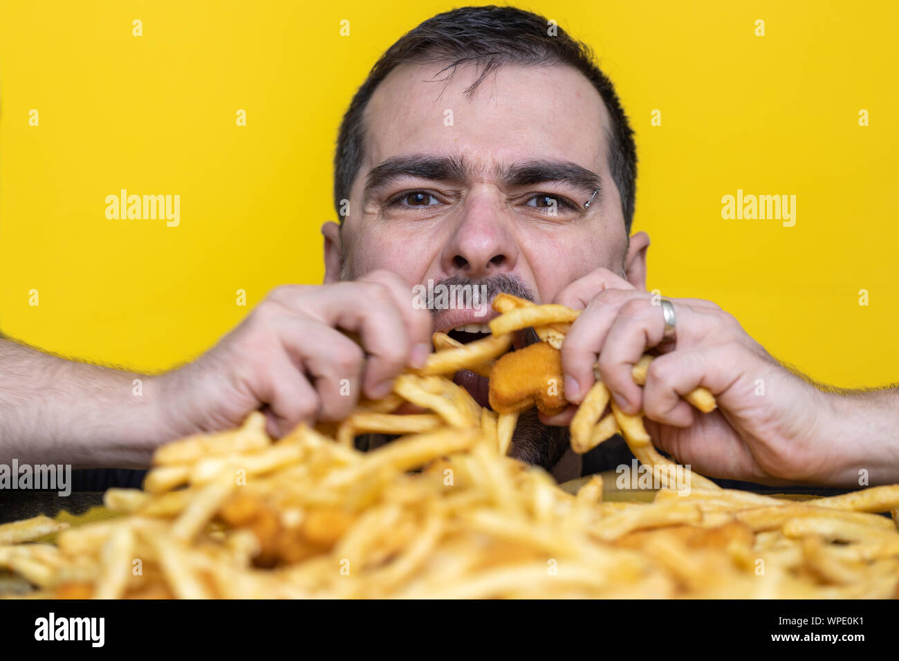 Man eating huge burger hi-res stock photography and images - Alamy