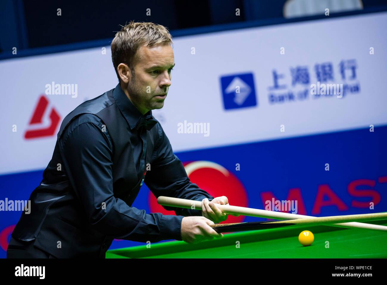 English professional snooker player Allister Carter plays a shot at the ...