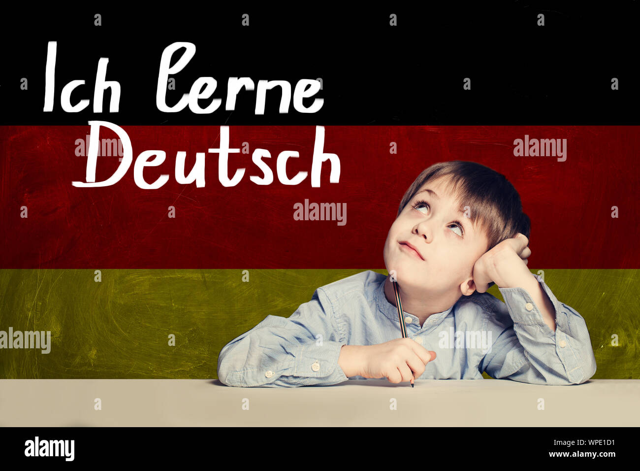 Thinking child boy student against the Germany flag background. Deutsch ...
