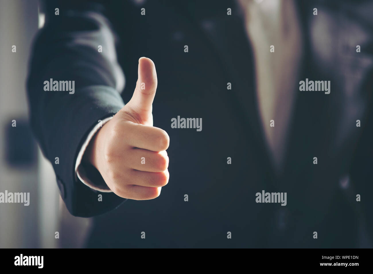 businessman show thumb up Stock Photo - Alamy