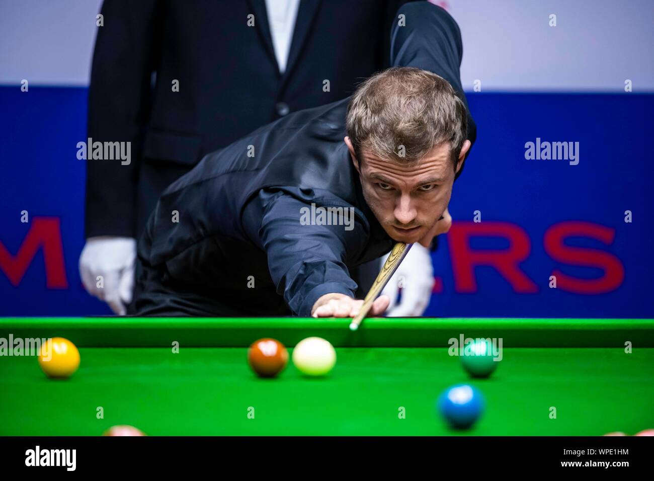 English professional snooker player Jack Lisowski plays a shot at the ...