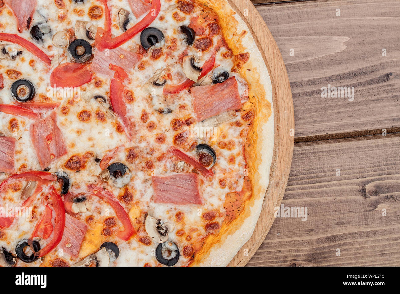 Pizza capricciosa traditional italian meal from prosciutto mushrooms ...