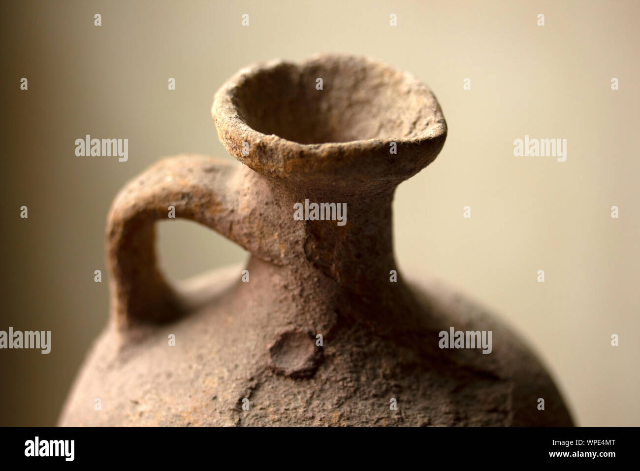 antique, earthen water pot, on color background Stock Photo - Alamy