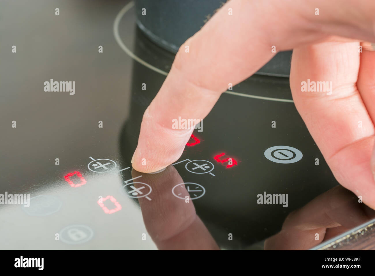 Induction cooker with touch control panel Stock Photo - Alamy