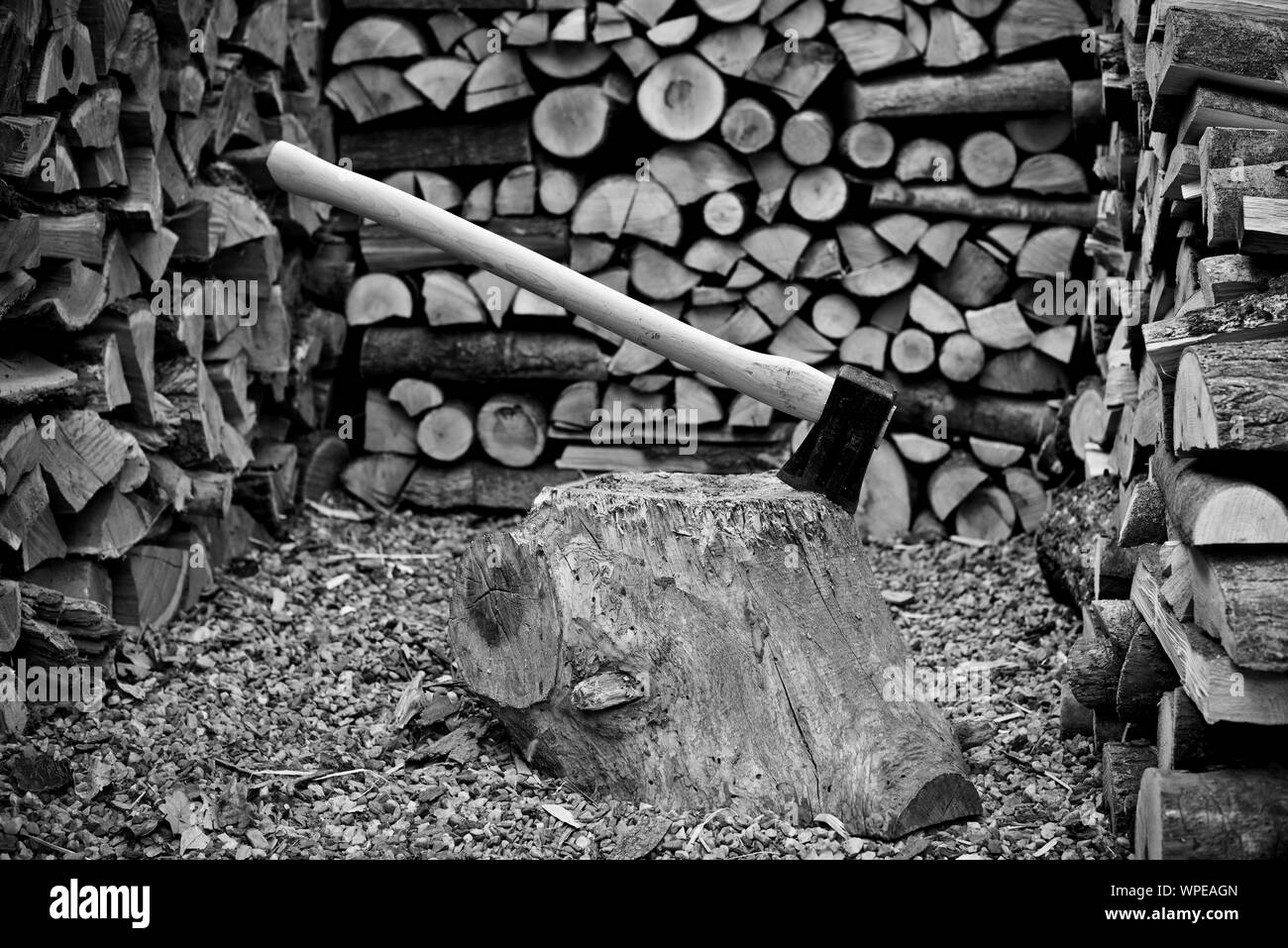 A old axe with fire wood Stock Photo - Alamy
