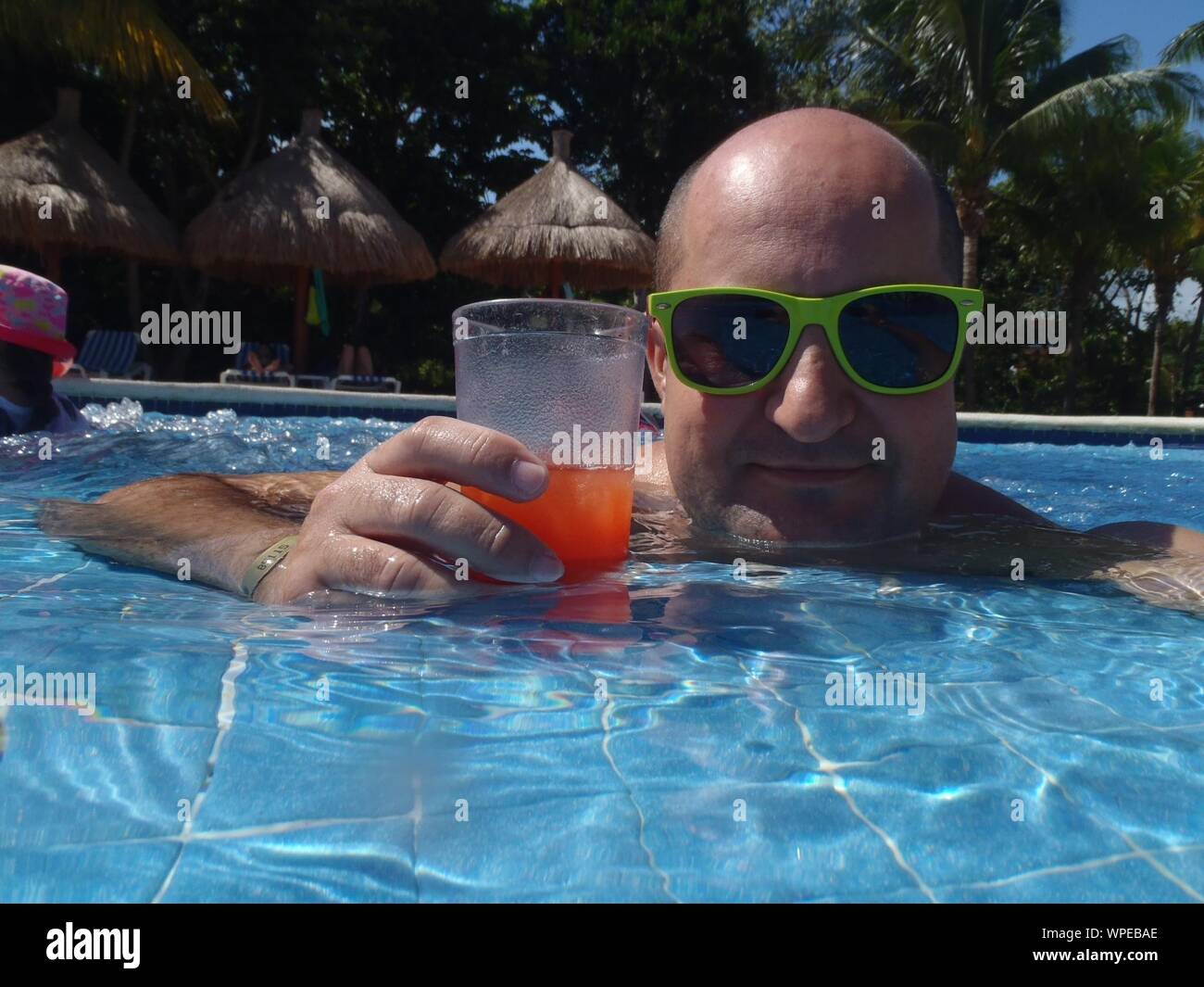 Bald man swimming hi-res stock photography and images - Alamy