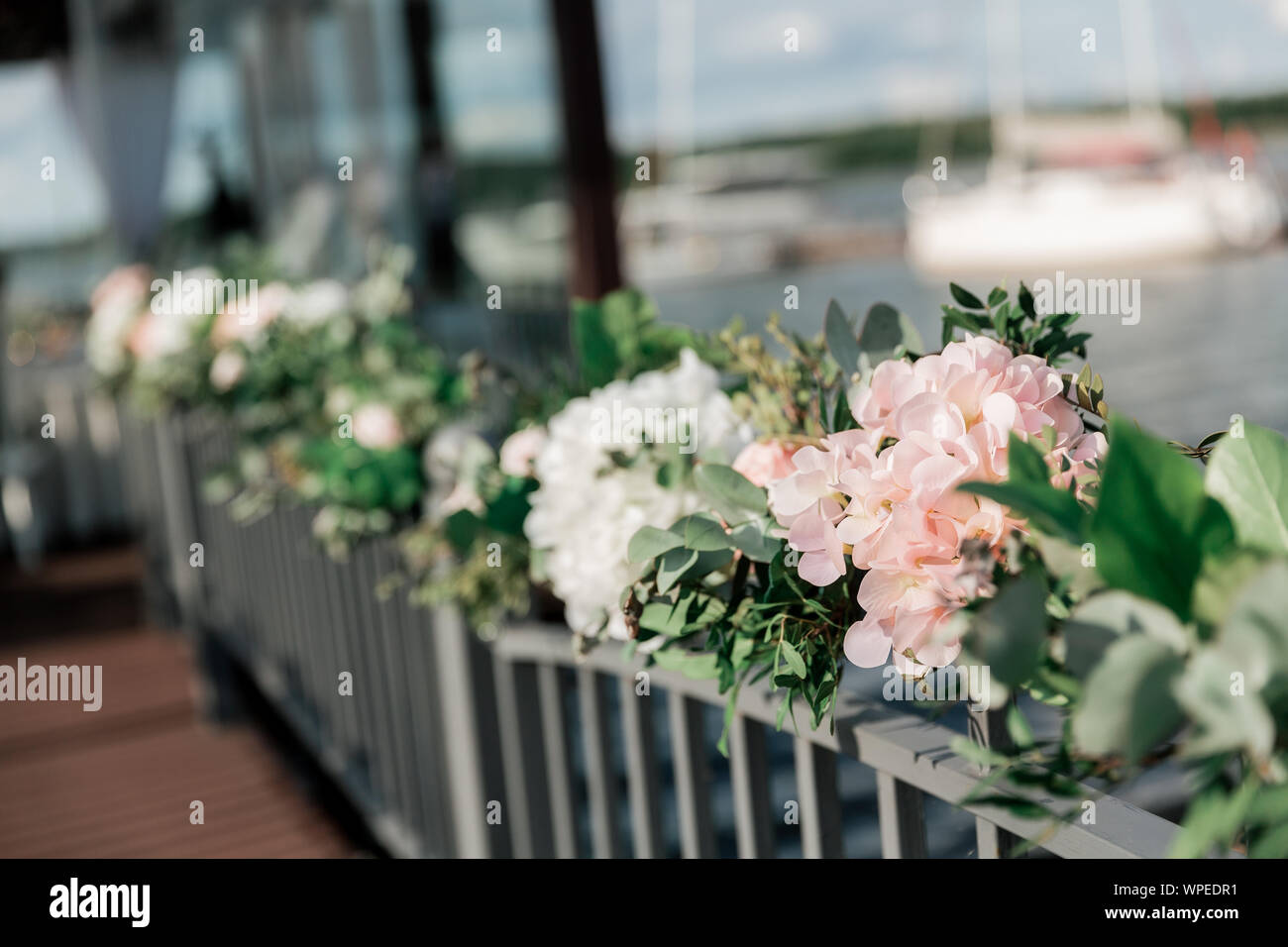 background image of beautiful flowers in a street cafe Stock Photo - Alamy