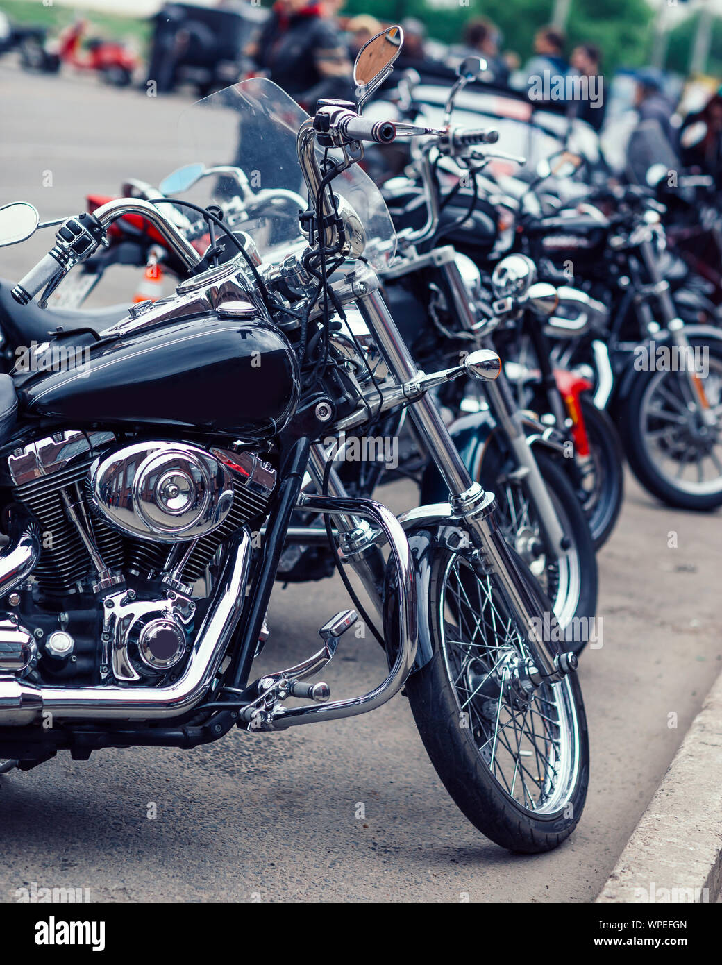 Group of motorbikes parked on street hi-res stock photography and ...