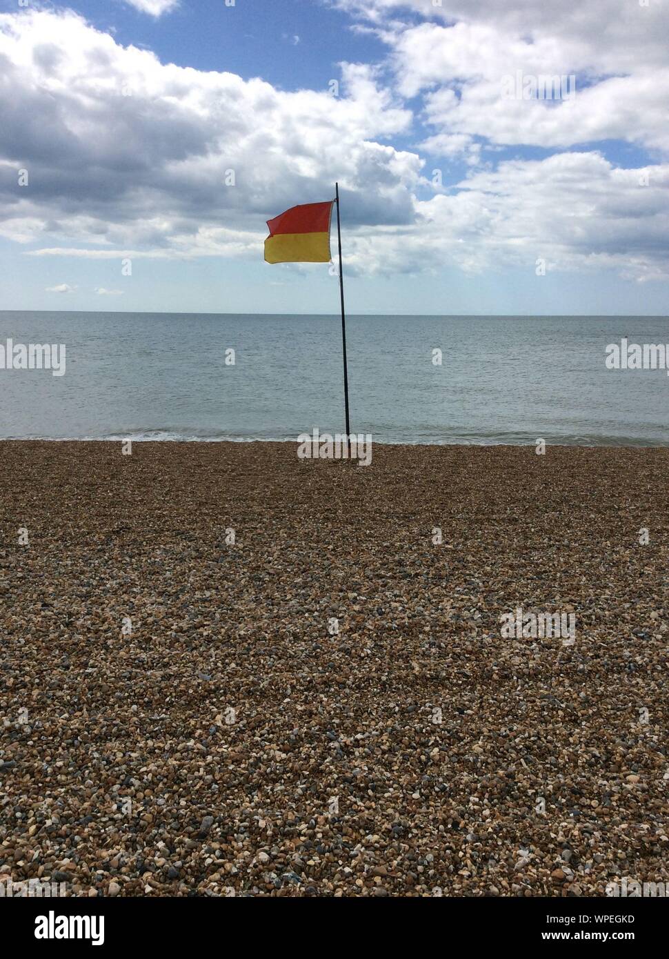 Safe Bathing Flag On Beach Stock Photo - Alamy