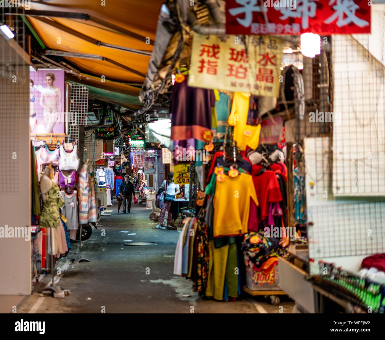 Taipei, Taiwan: Small clothing shops at side street market with ...