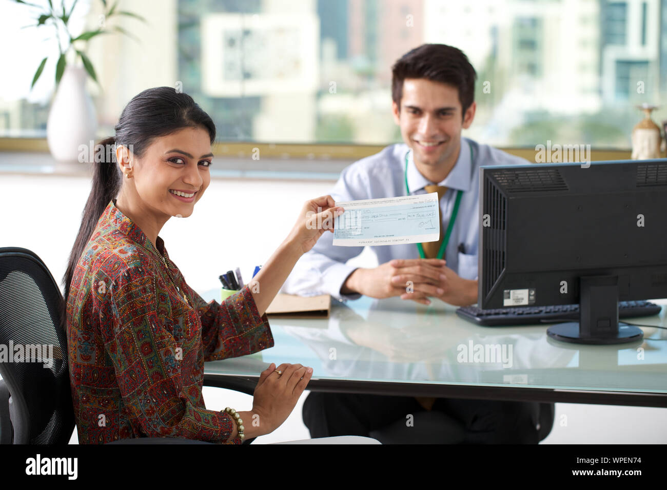 Finance executive cheque hi-res stock photography and images - Alamy