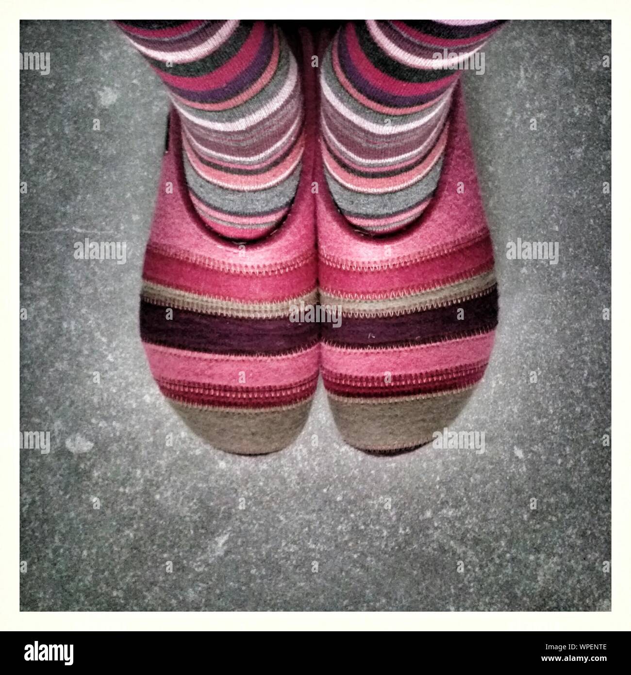 Woman wearing slippers hi-res stock photography and images - Alamy