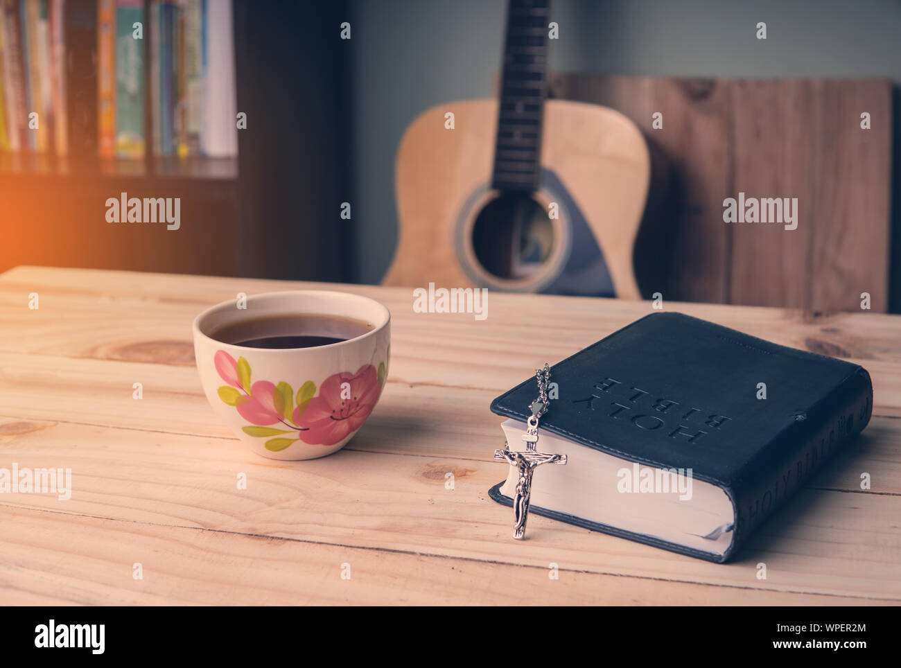 Christian man Bible study. Bible, books and guitar worship God. freedom ...