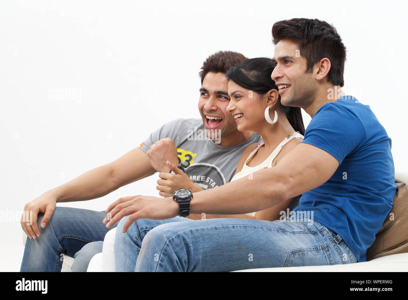 Woman watching television friend hi-res stock photography and images ...