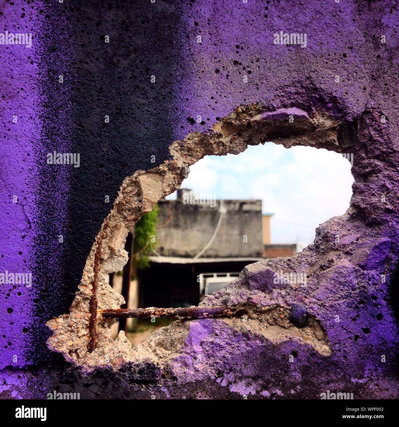Broken wall hole hi-res stock photography and images - Alamy