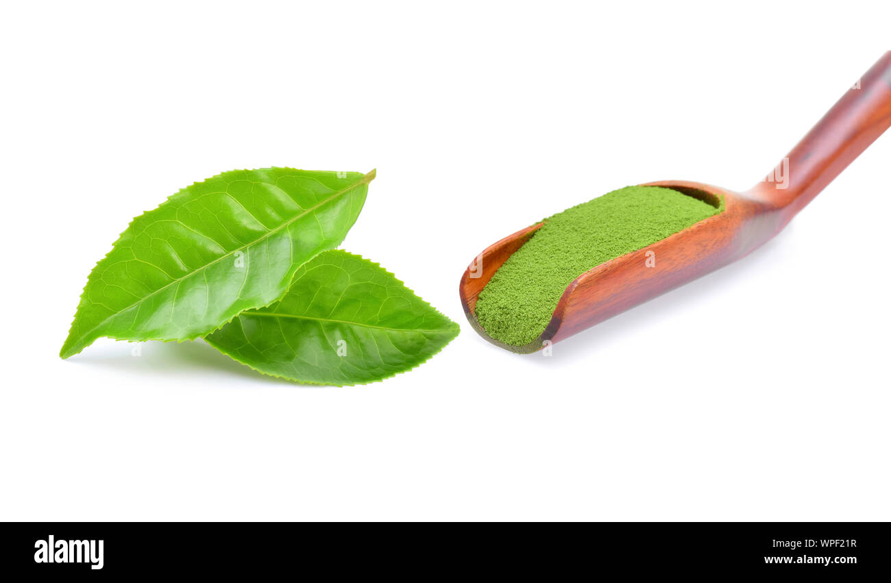 powder green tea with green tea leaf on white background Stock Photo ...