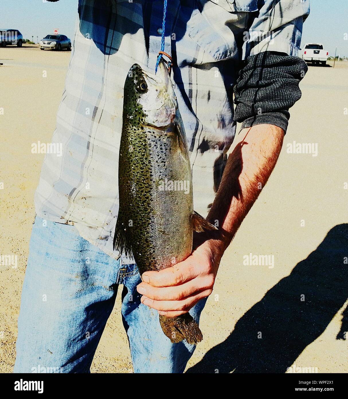 Man catching trout hi-res stock photography and images - Alamy