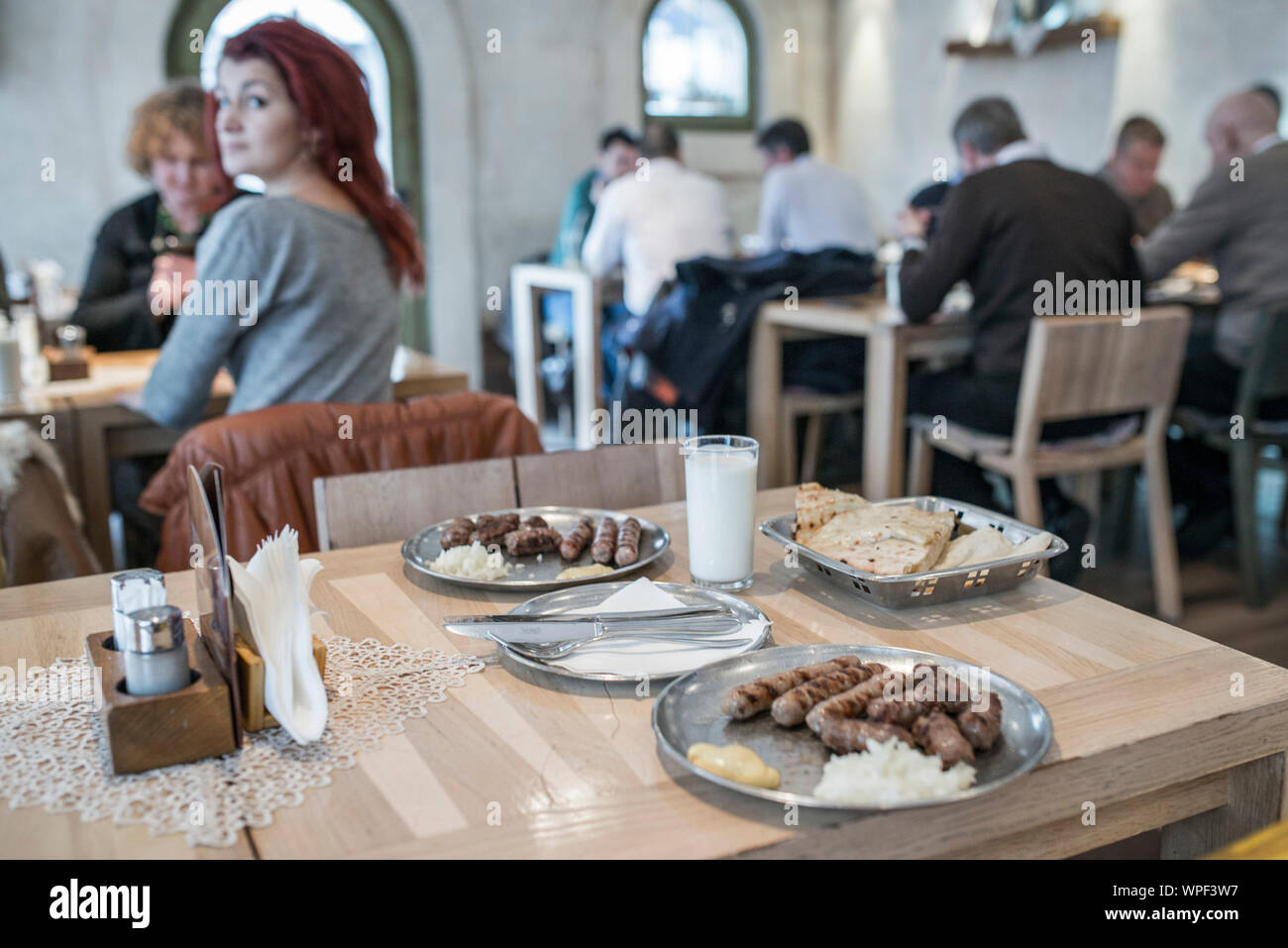 Bosnian traditional fast, street food: Bosnian pie and cevapcici served ...