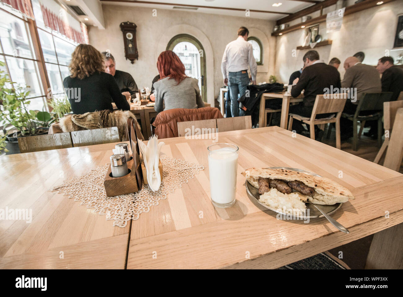 Bosnian traditional fast, street food: Bosnian pie and cevapcici served ...