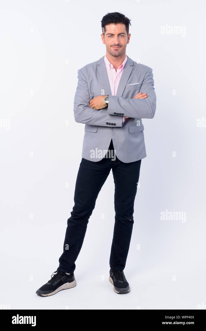 Full body shot of young handsome businessman Stock Photo - Alamy