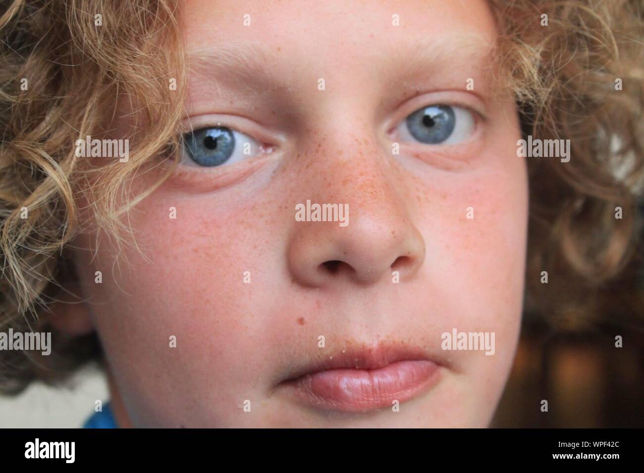 Boy with brown hair and eyes hi-res stock photography and images - Alamy