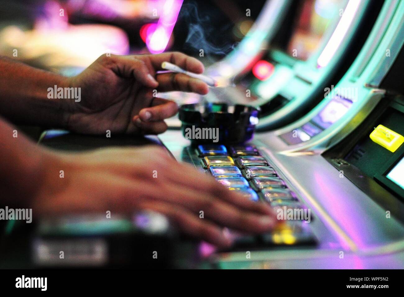 Playing machine hi-res stock photography and images - Alamy