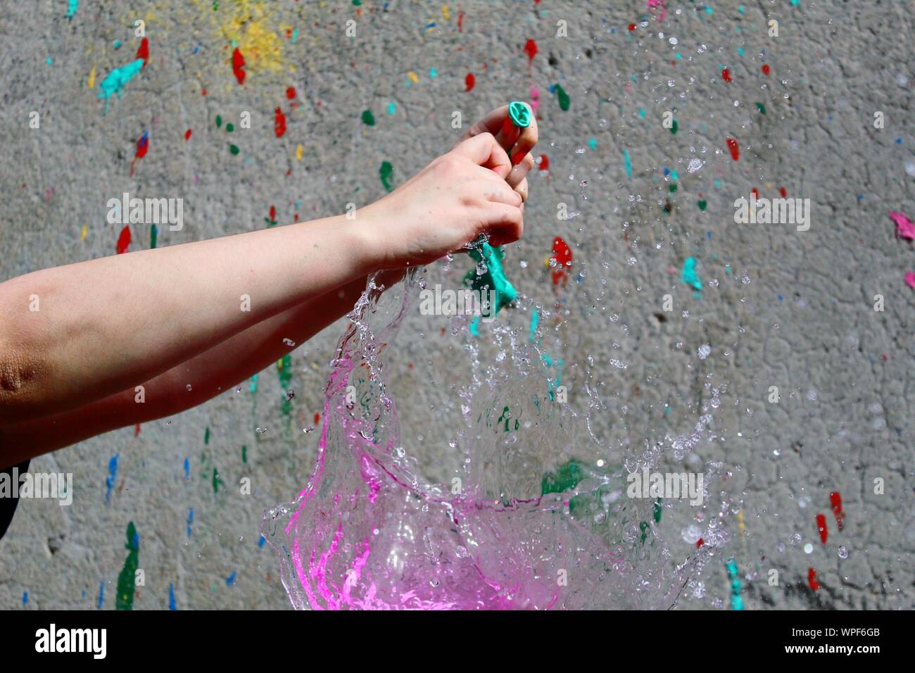 Balloon bursting person hi-res stock photography and images - Alamy