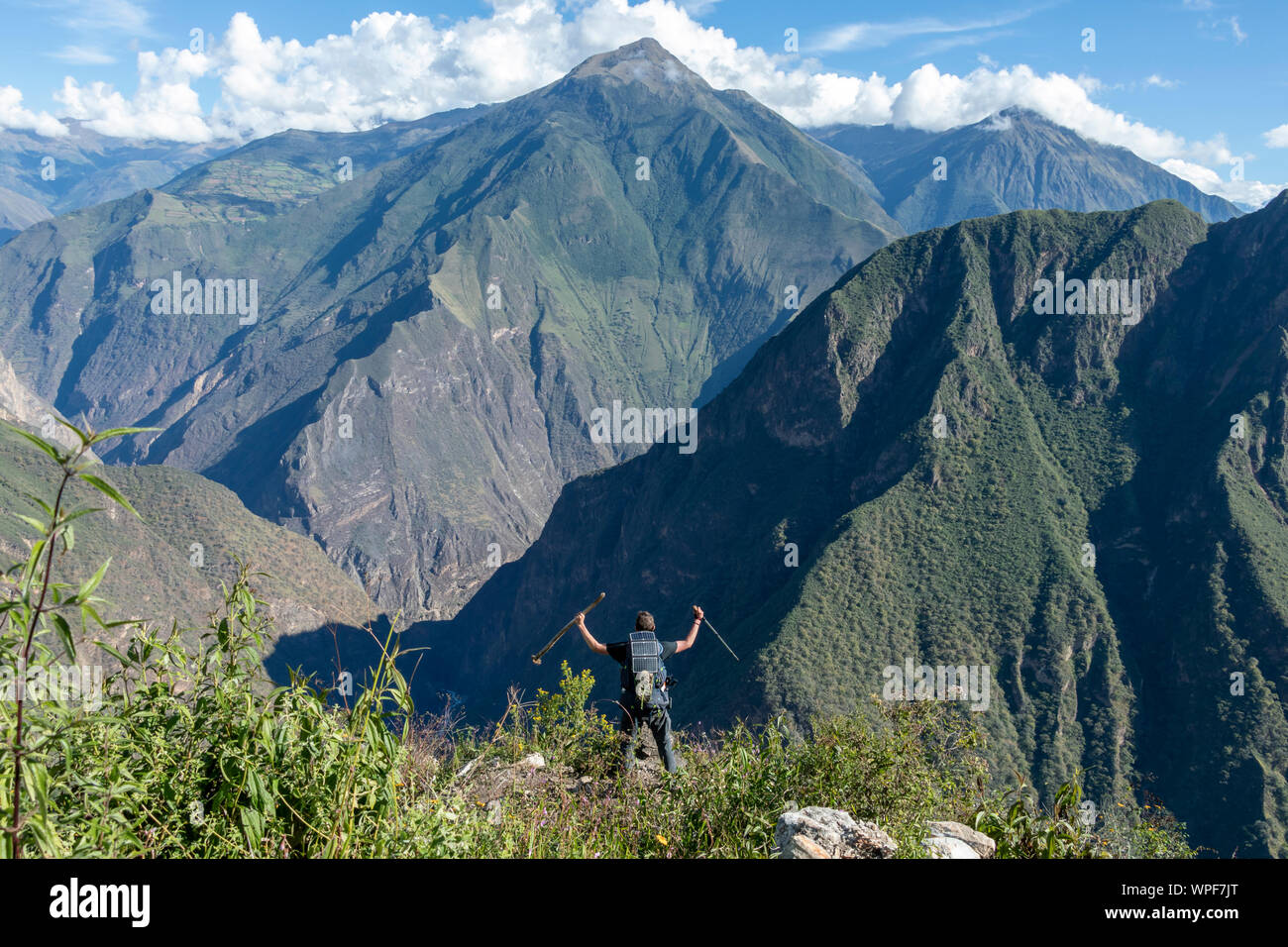 Young hiker man trekking with backpack in Peruvian mountains. Active ...
