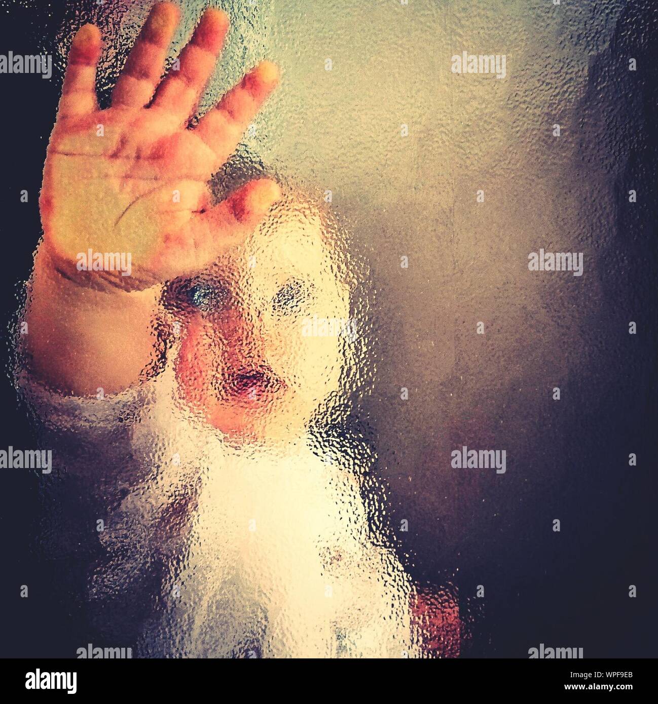 Hand touching frosted glass hi-res stock photography and images - Alamy