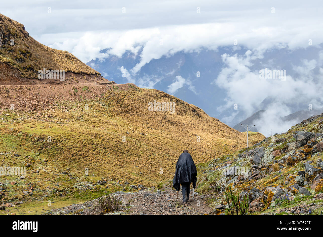 Young hiker man trekking with backpack in Peruvian mountains. Active ...