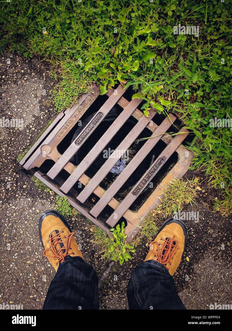Man manhole hi-res stock photography and images - Alamy