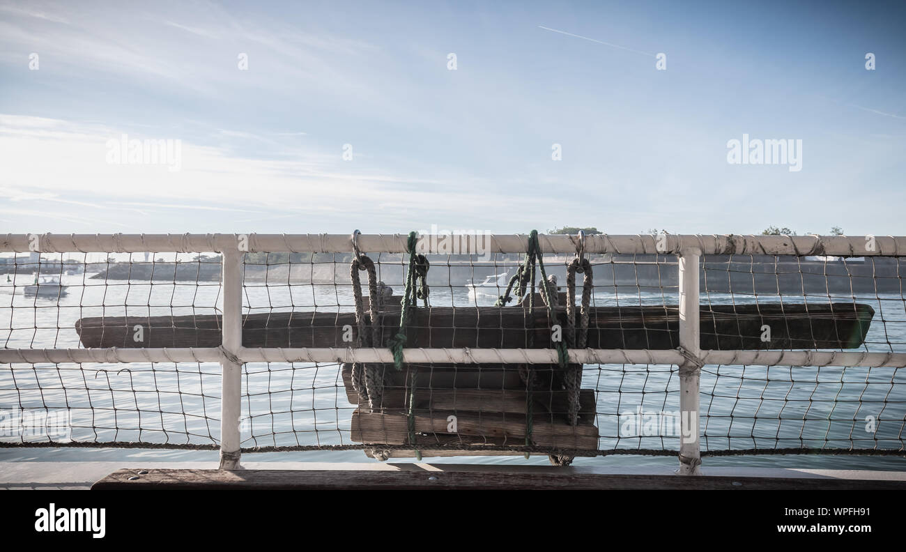 rear view of a ferry leaving the port towards the island of Yeu, France ...