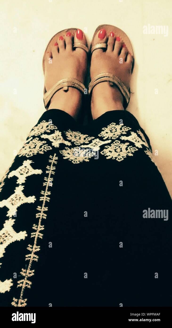 Woman wearing slippers hi-res stock photography and images - Alamy