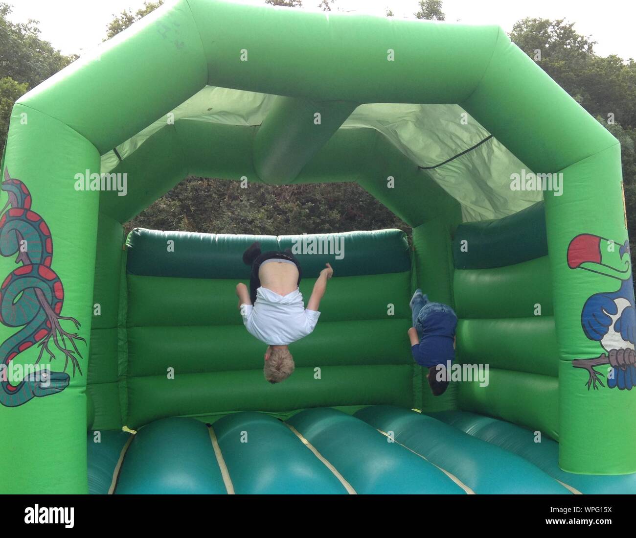 Boys jumping into hi-res stock photography and images - Alamy