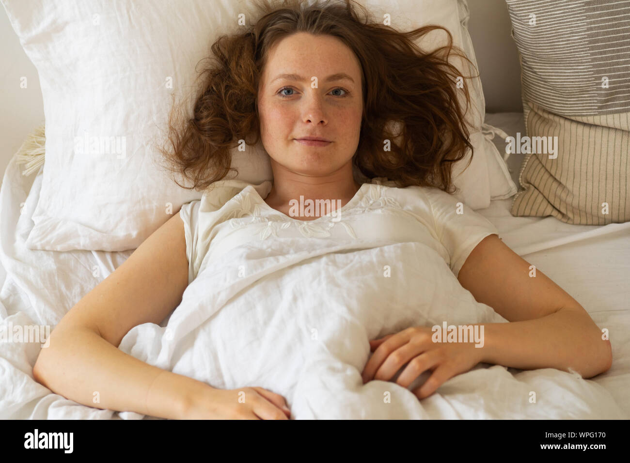 Woman awakening hi-res stock photography and images - Alamy