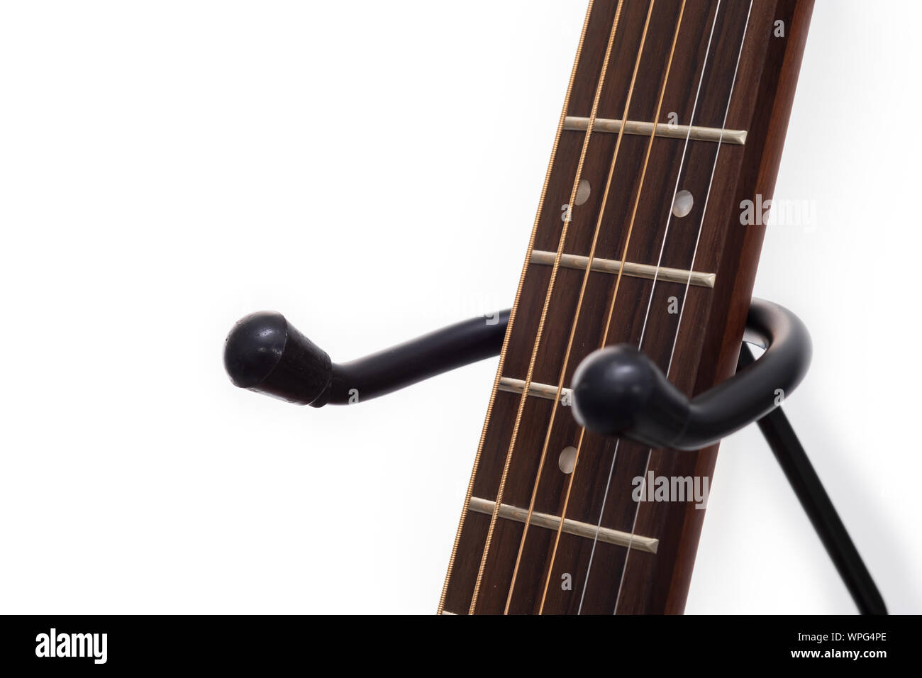 Guitar is a classic instrument on stand Stock Photo - Alamy