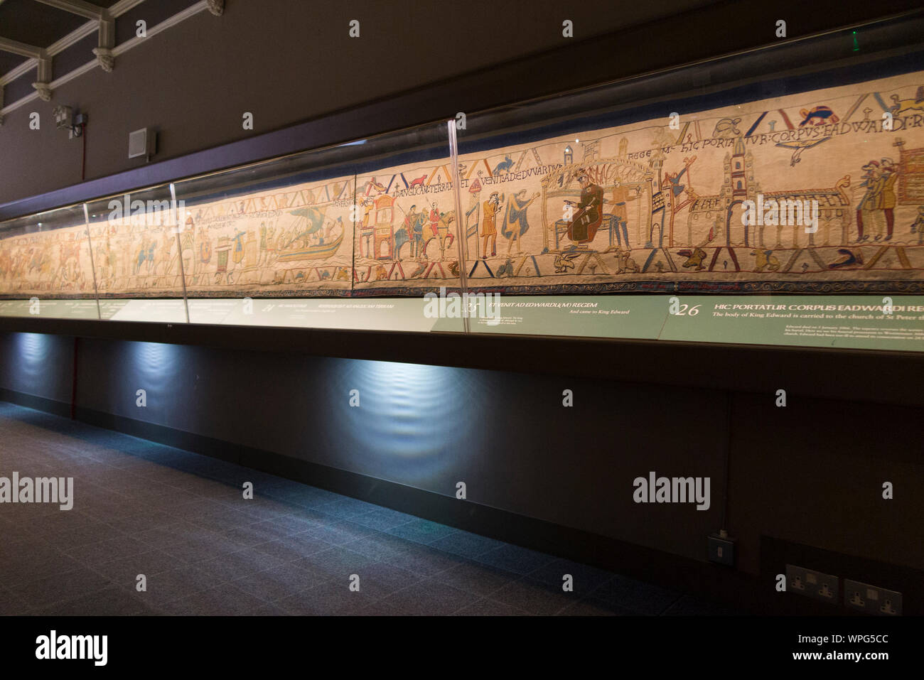 Child visitor to the Victorian replica of the Bayeux tapestry housed in ...