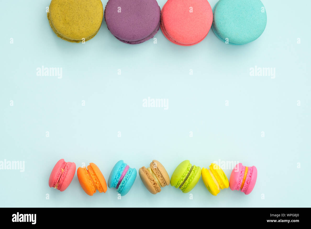 colorful macaroons on turquoise background, Sweet and tasty for cooking ...