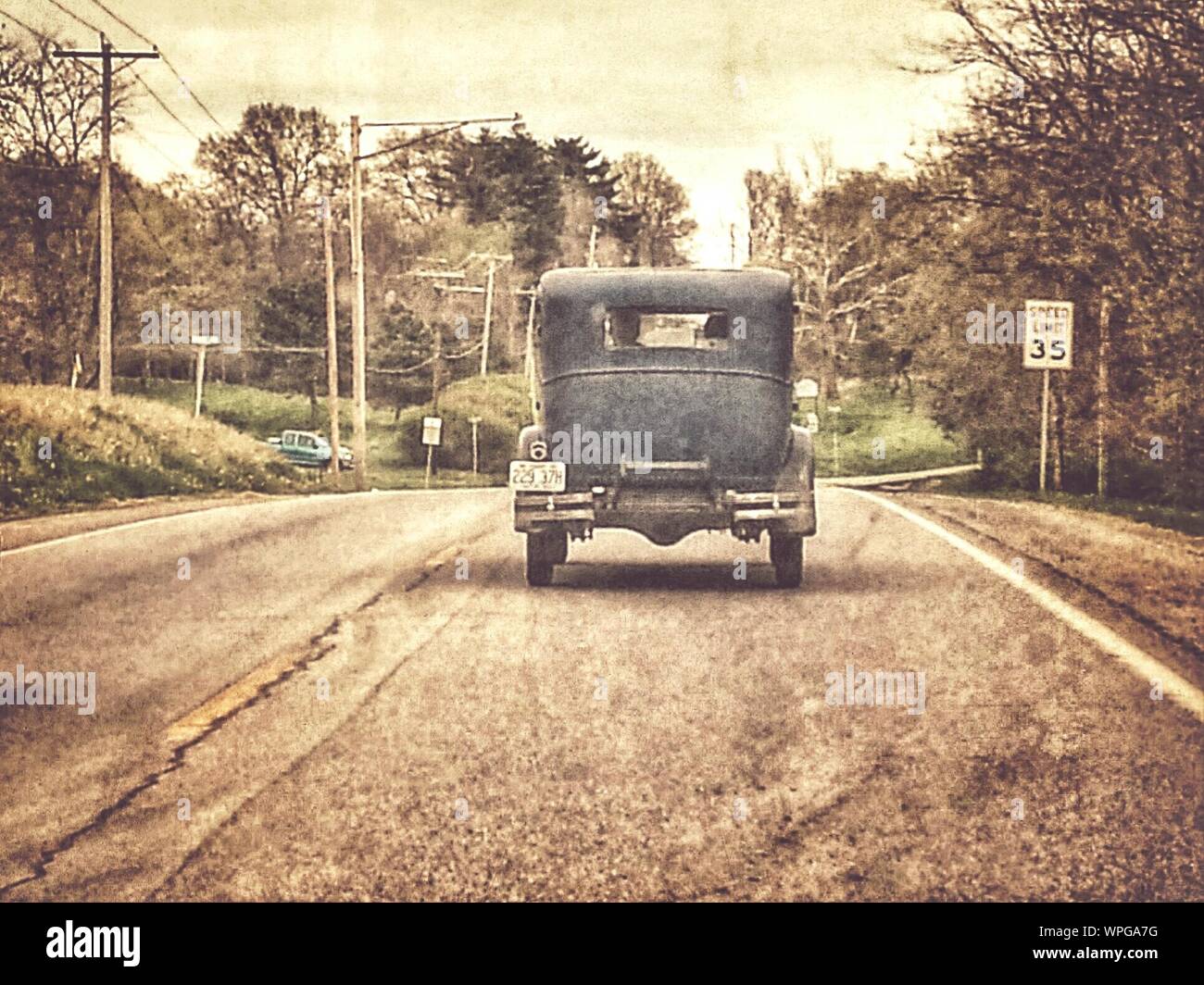 Car rolling road hi-res stock photography and images - Alamy