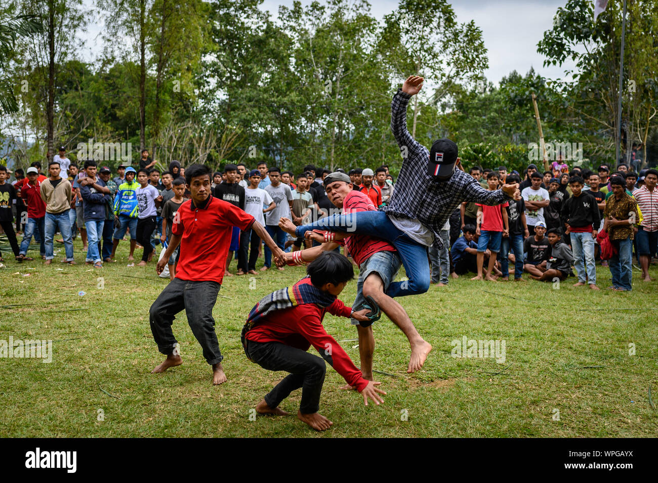 August 31, 2019, Toraja Utara, South sulawesi, Indonesia: Men in action ...