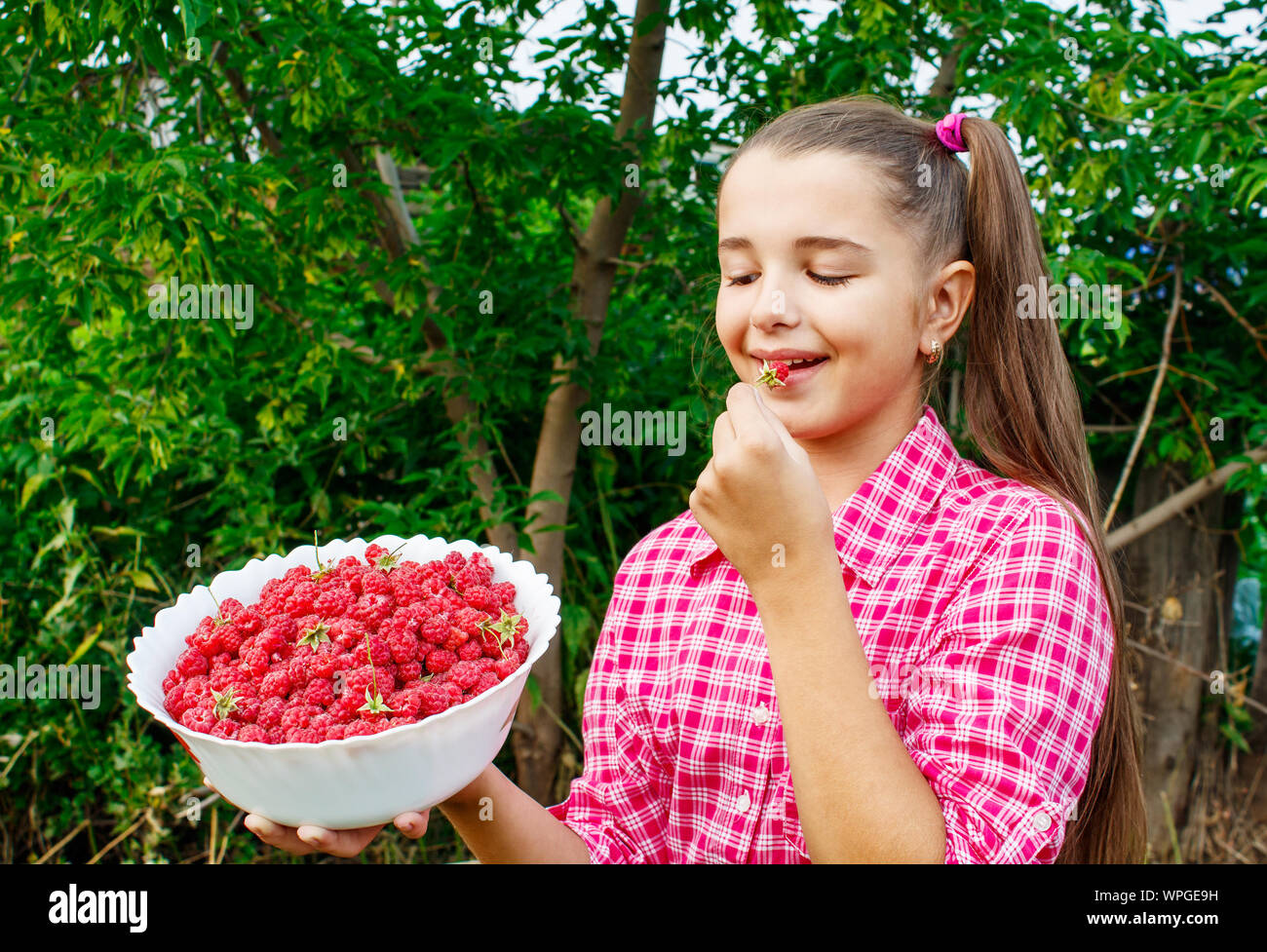 Teen Eat Fruit Garden High Resolution Stock Photography and Images - Alamy
