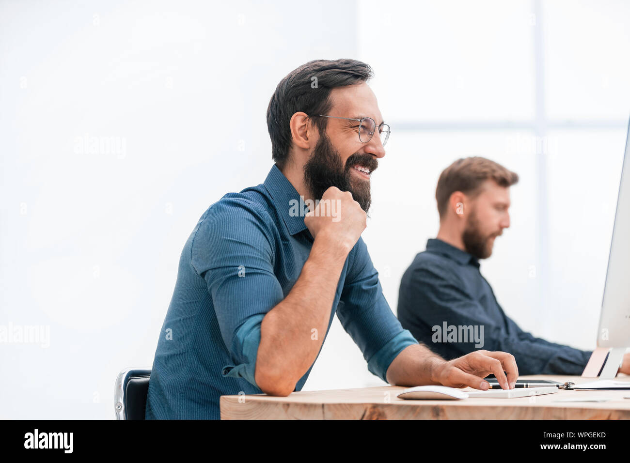 businessman uses a computer to work with documents Stock Photo - Alamy