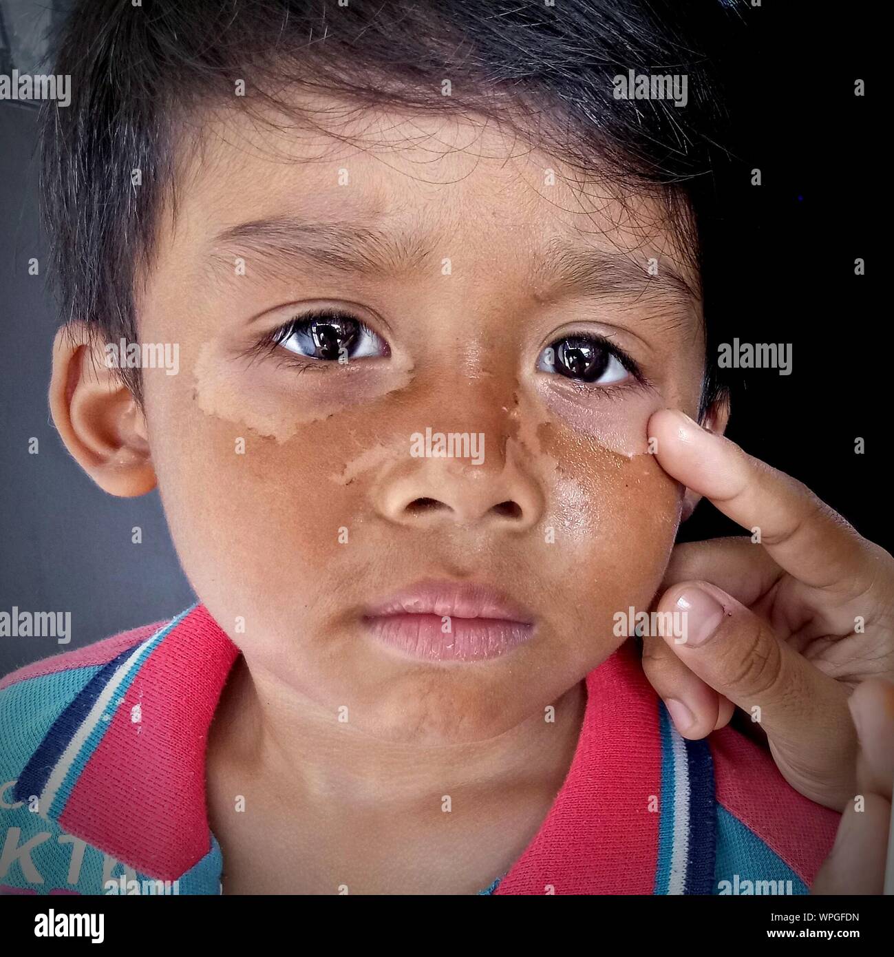 One hand touching her face hi-res stock photography and images - Alamy