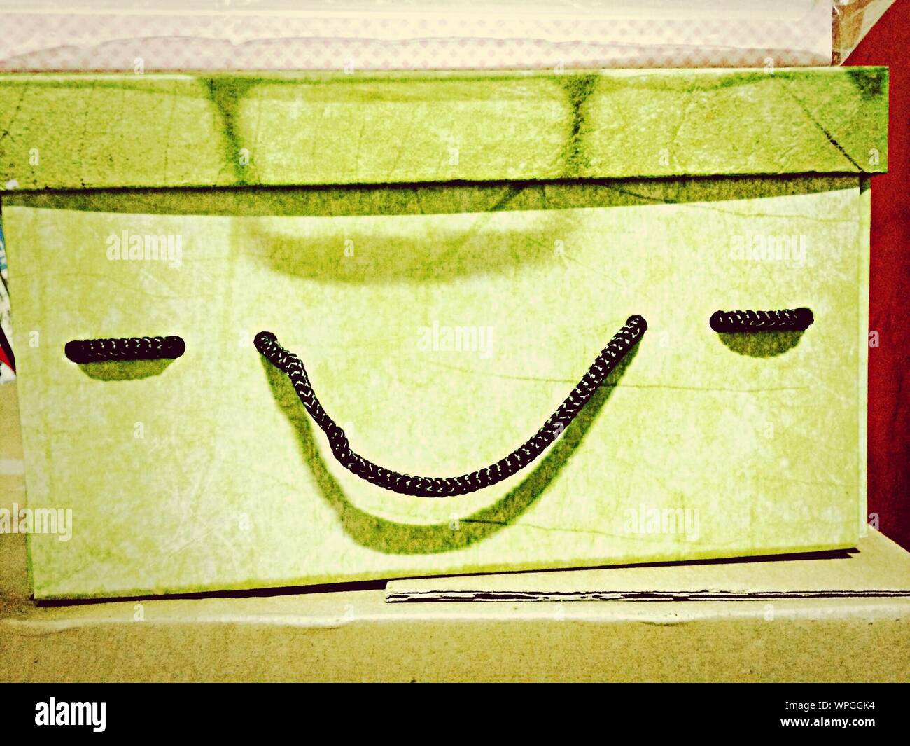 Close-up Of Green Box With Smiley Face Stock Photo - Alamy