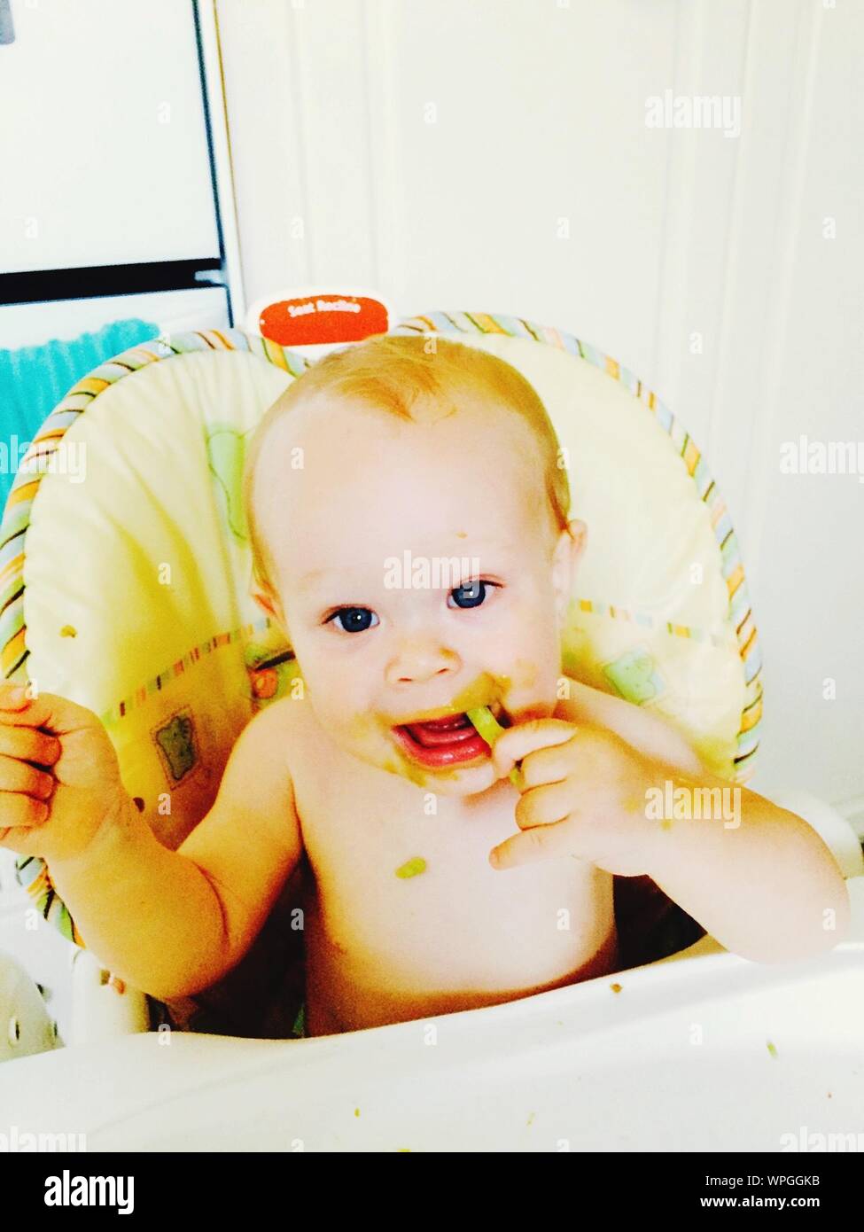 Baby eating food messy hi-res stock photography and images - Alamy