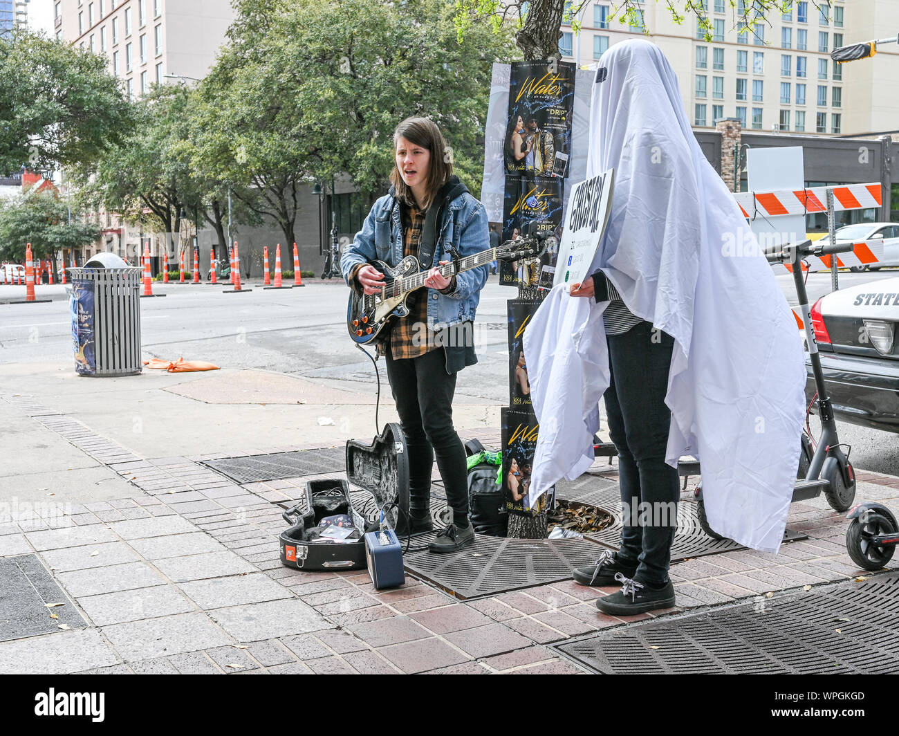 Street musician playing in downtown Austin Texas during SXSW festival ...