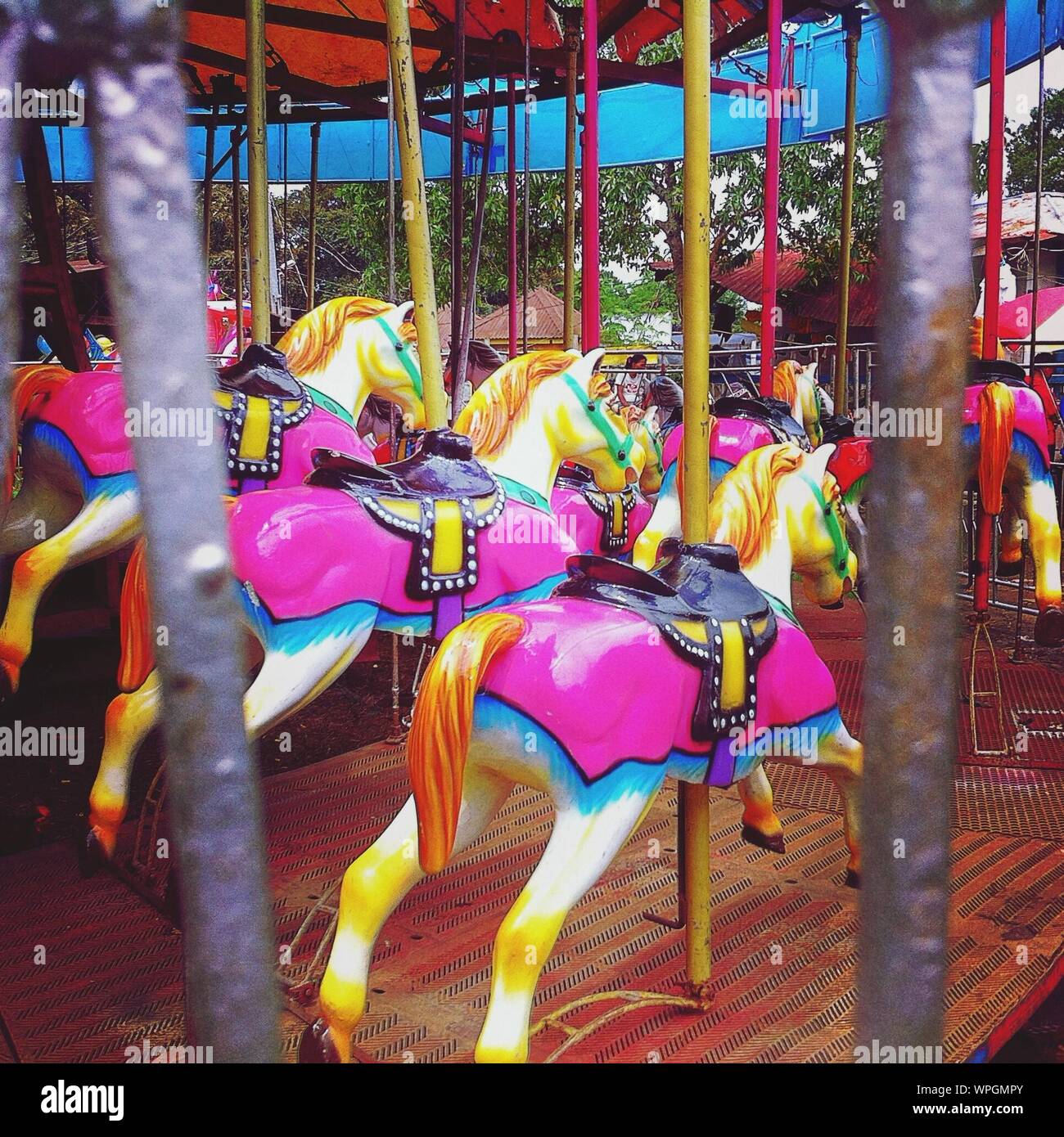 Pink carousel horse hi-res stock photography and images - Alamy