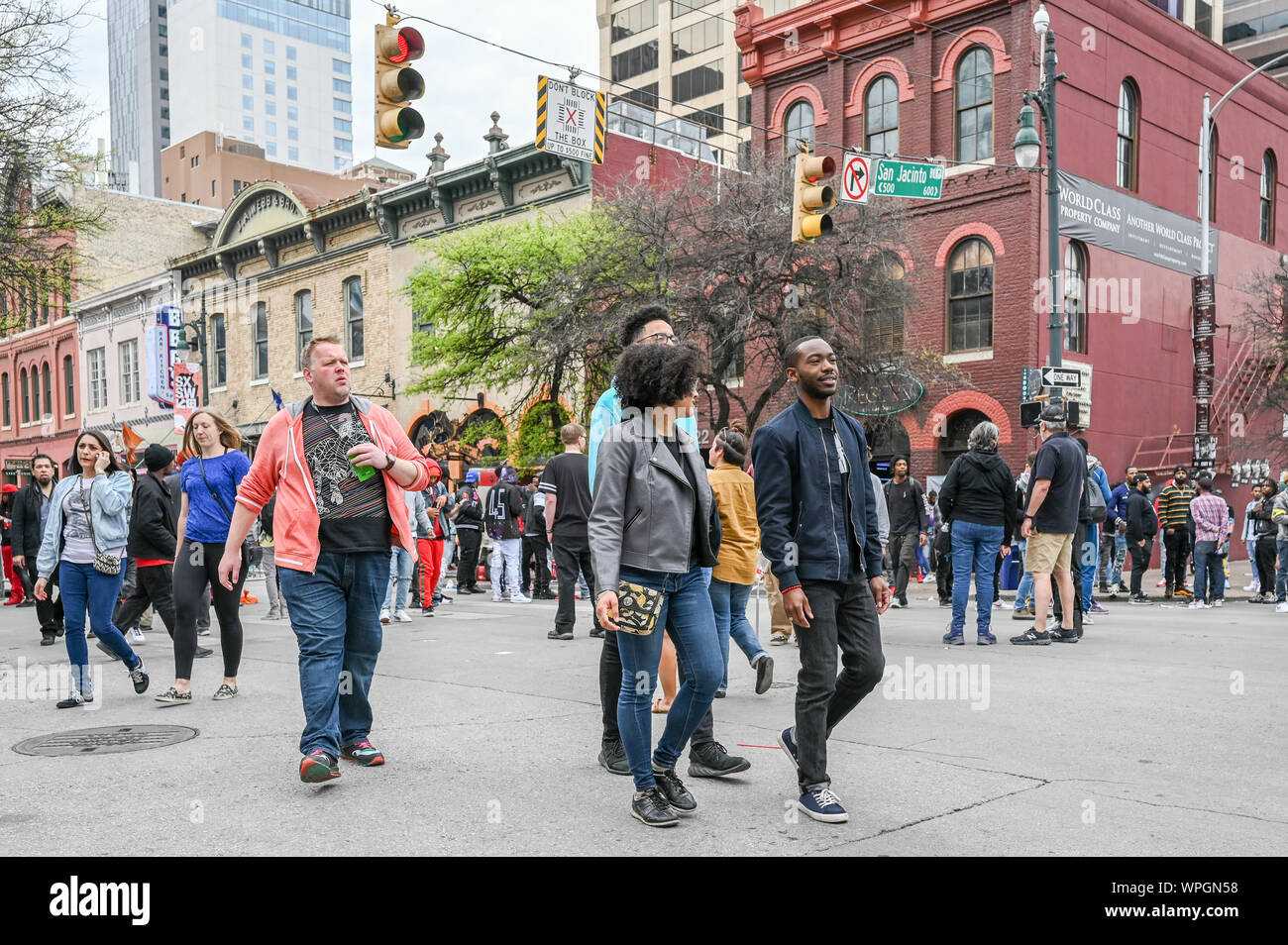 Sixth Street in Austin Texas during SXSW festival in March 2019. This ...