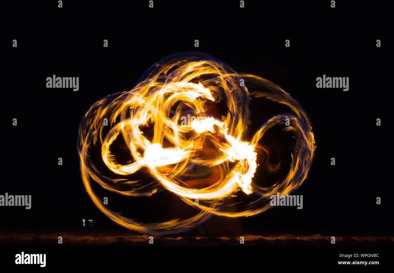 Fire twirling hi-res stock photography and images - Alamy